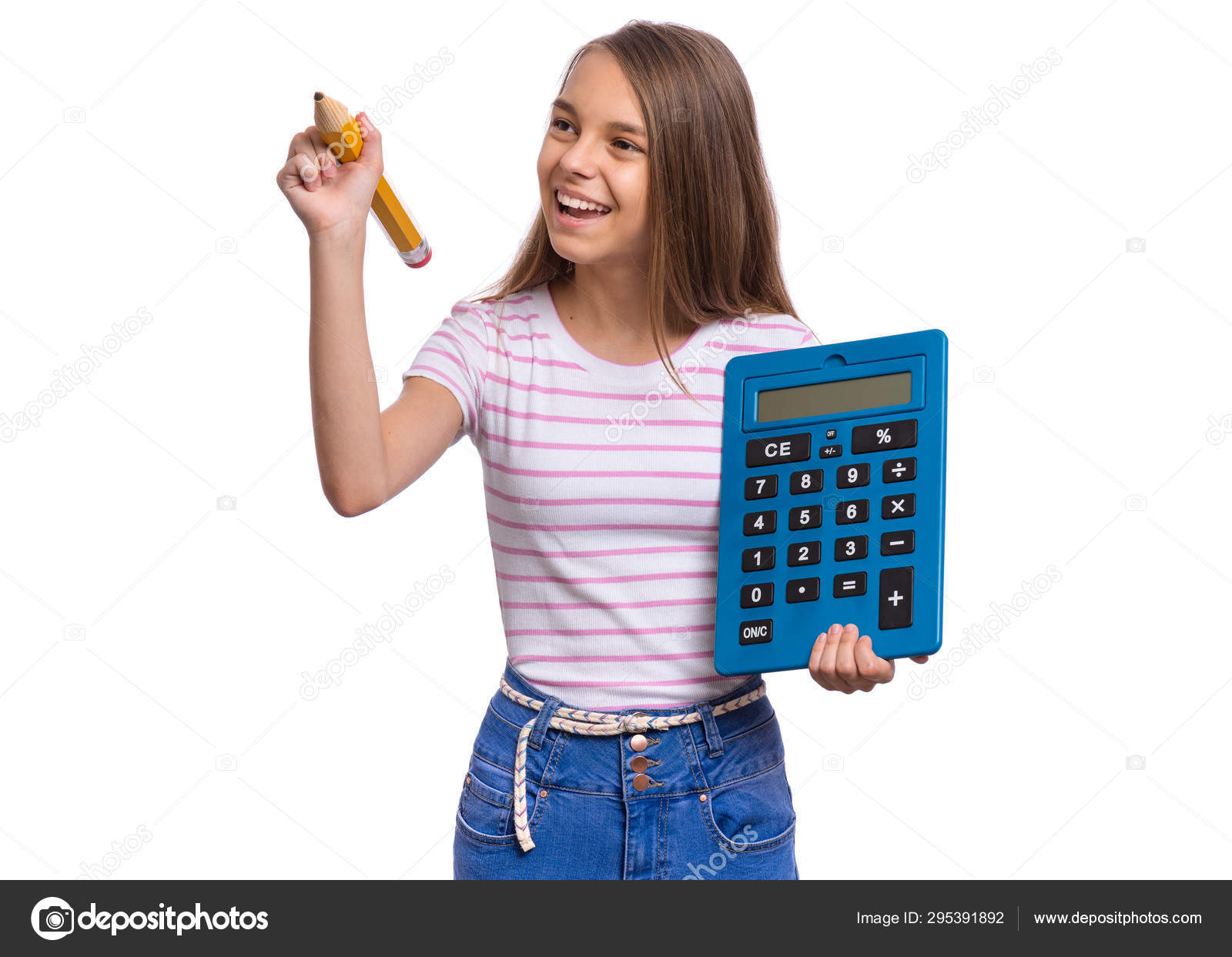 Teen girl with big calculator Stock Photo by ©VaLiza 295391892
