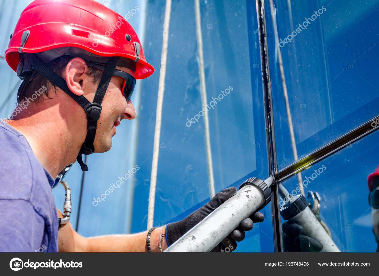 Industrial Climber Applying Silicone Rubber Juncture Building Glass ...
