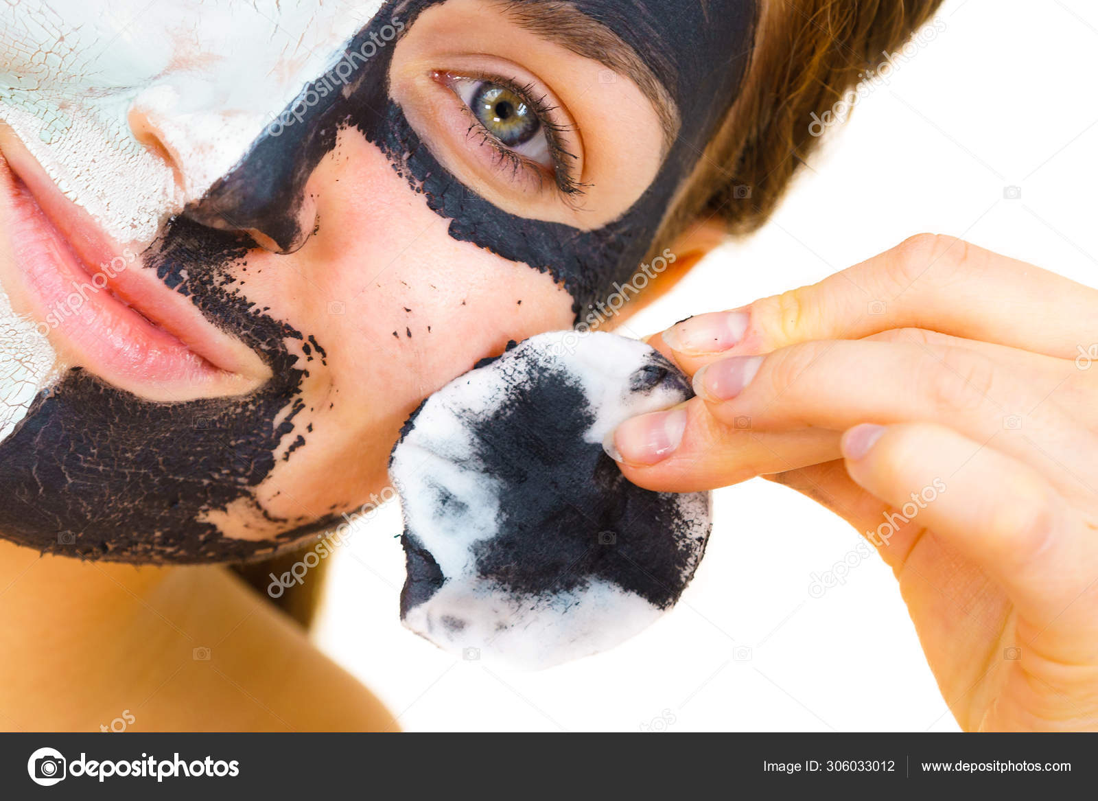 Girl remove black white mud mask from face Stock Photo by ©Voyagerix ...