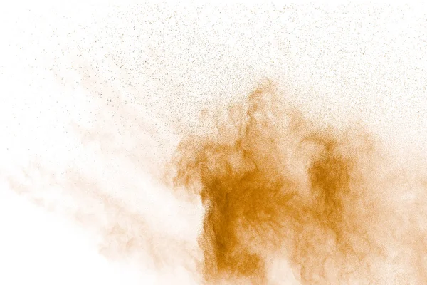 Stopping the movement of brown powder. Explosive brown powder on white ...