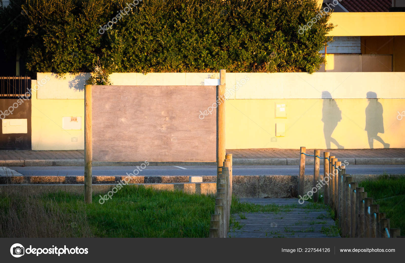 Wooden Advertisement Billboard Mockup Shadows Two People Warm Light ...