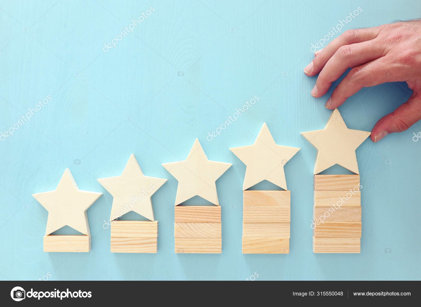 Business concept image of setting a five star goal. increase rating or ...