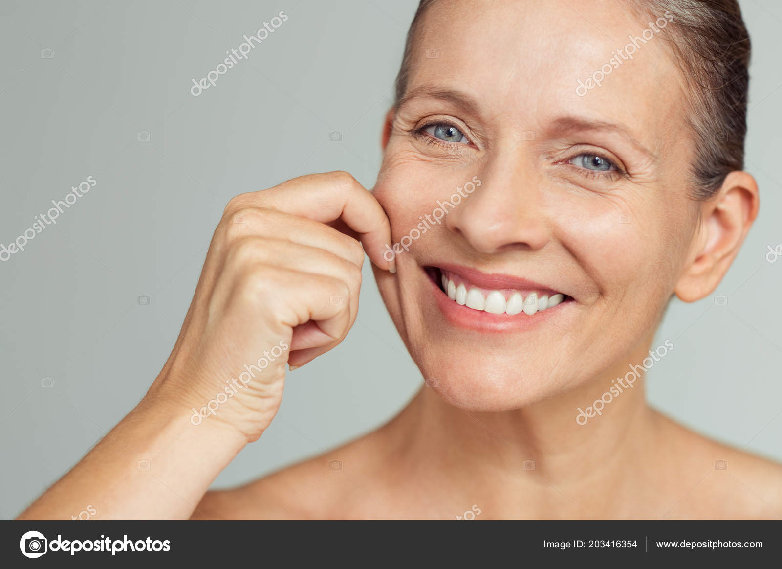 Senior Woman Pulling Cheeks Feel Softness Looking Camera Beauty ...