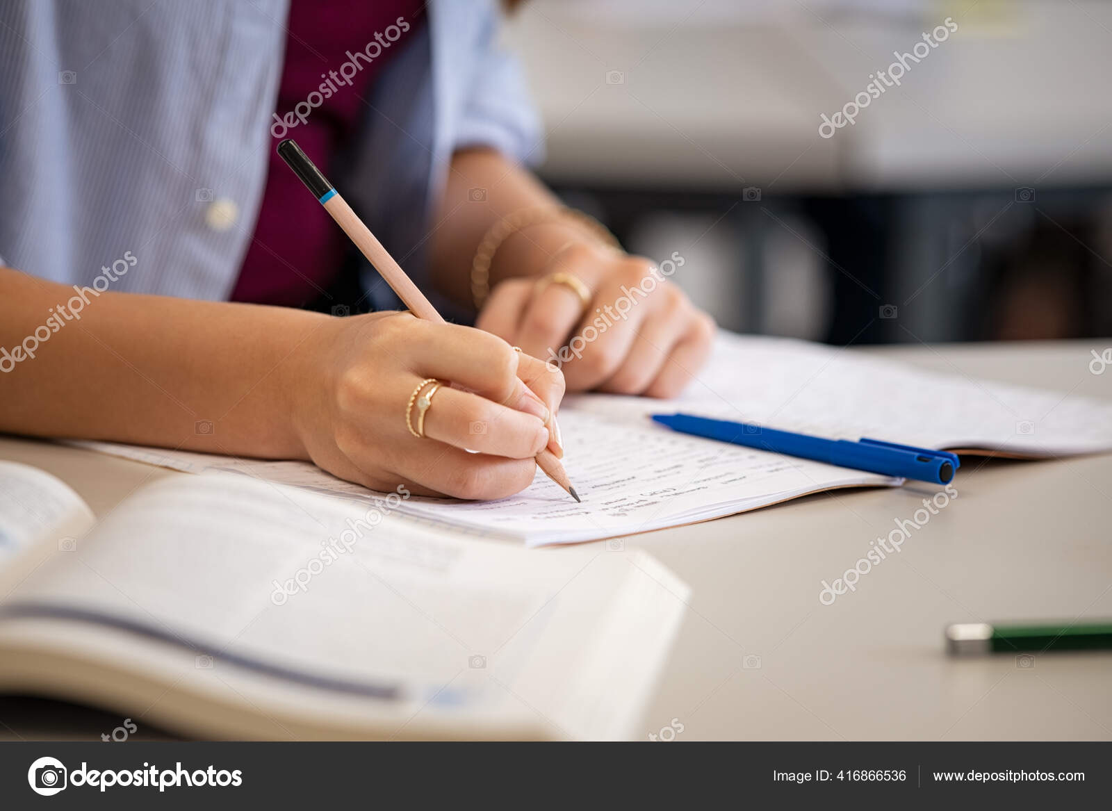 Students Taking Notebooks