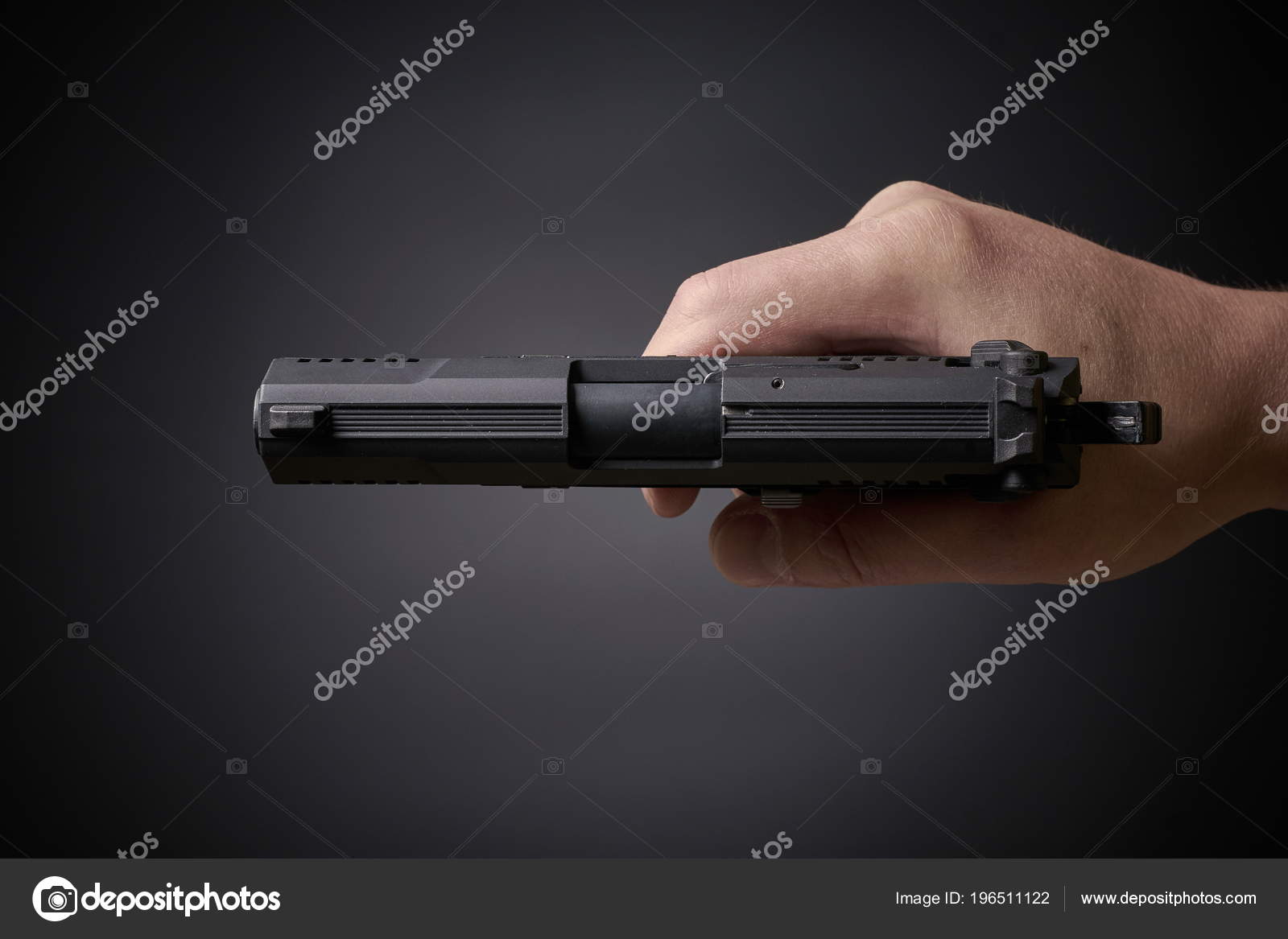 Aiming Handgun Pistol Top View Stock Photo by ©Schnoeppl 196511122