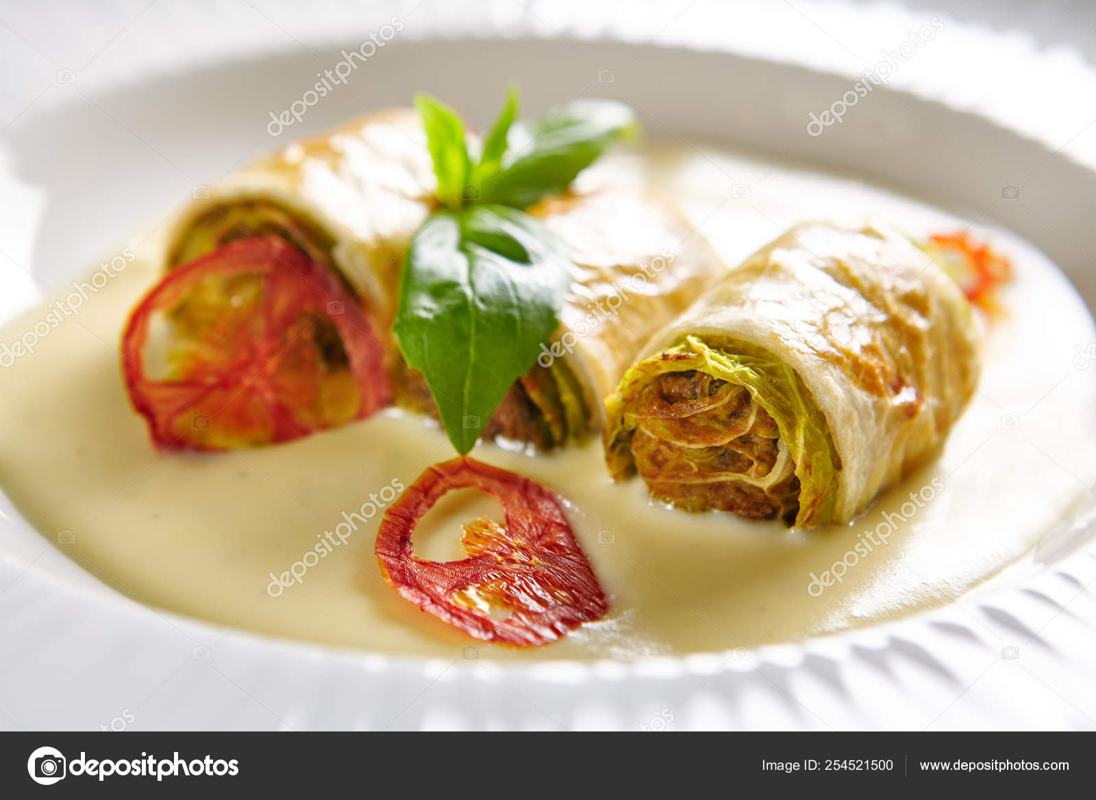 Baked Mini Cabbage Rolls in Creamy Sauce Close Up Stock Photo by ...