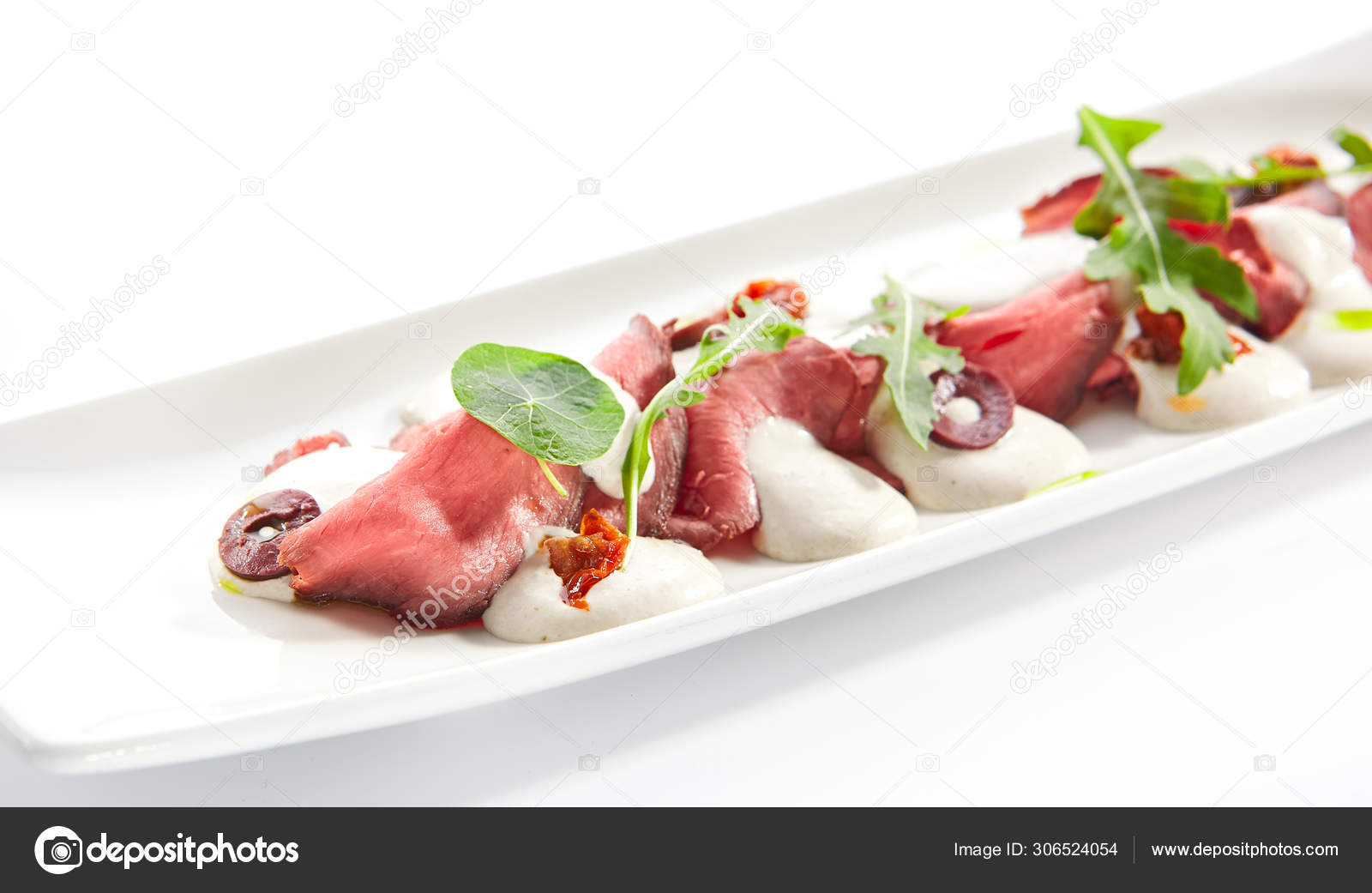 Beef vitello tonnato platter closeup Stock Photo by ©ryzhkov86 306524054