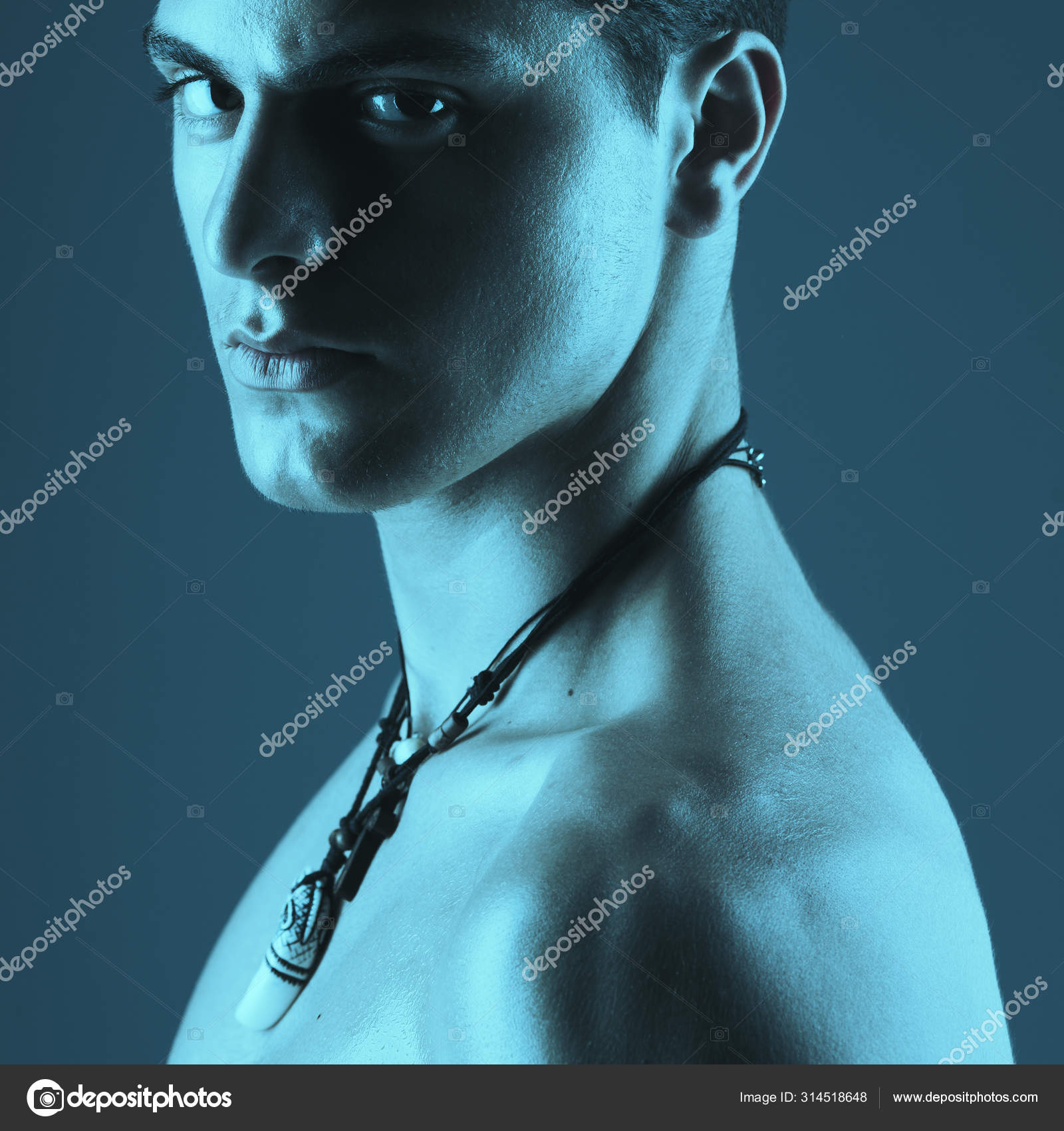 Young and Handsome concept. Profile portrait of 20-year-old man looking ...