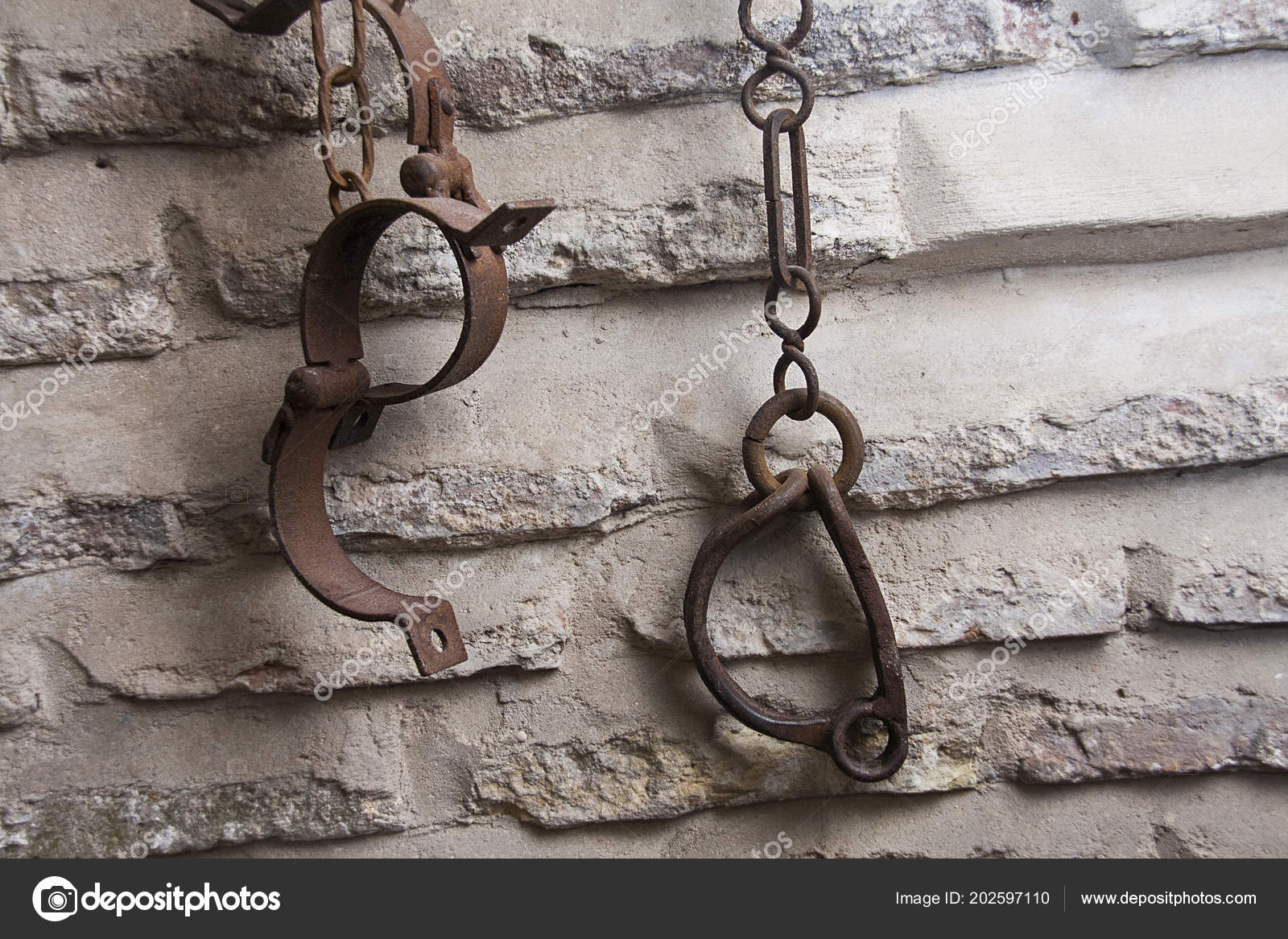 Slave Chained To Wall