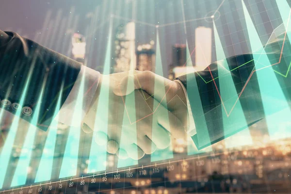 Double exposure of financial chart on cityscape background with two ...