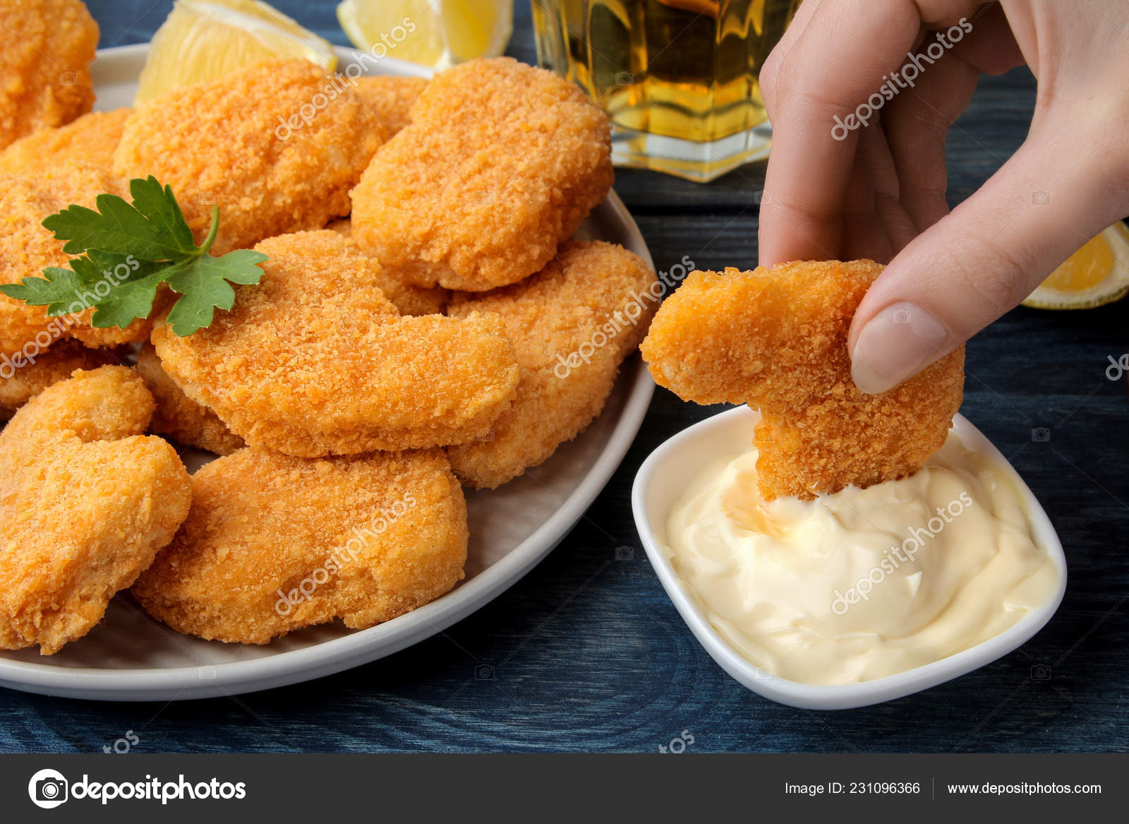 Girl Dunks Chicken Nuggets White Sauce Close Blue Wooden Background ...