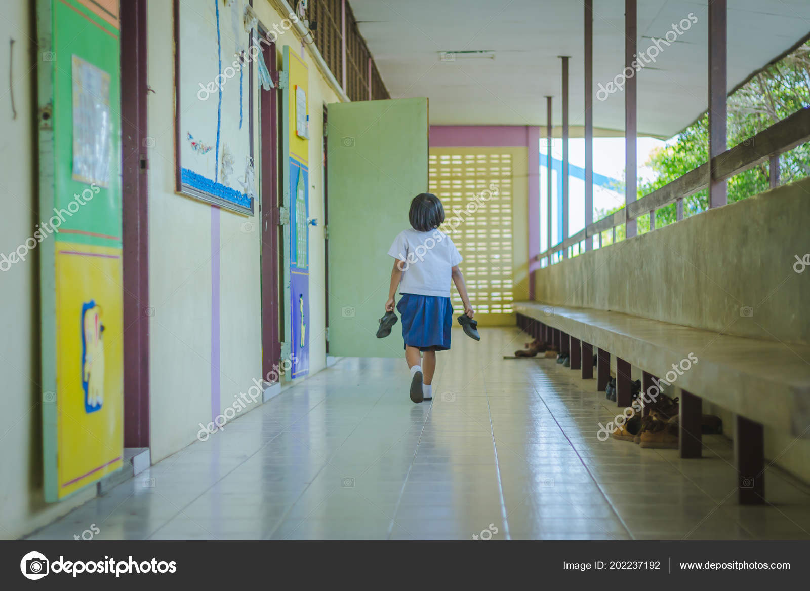 Elementary School Girl Walks Classroom Too Late Stock Photo by ...