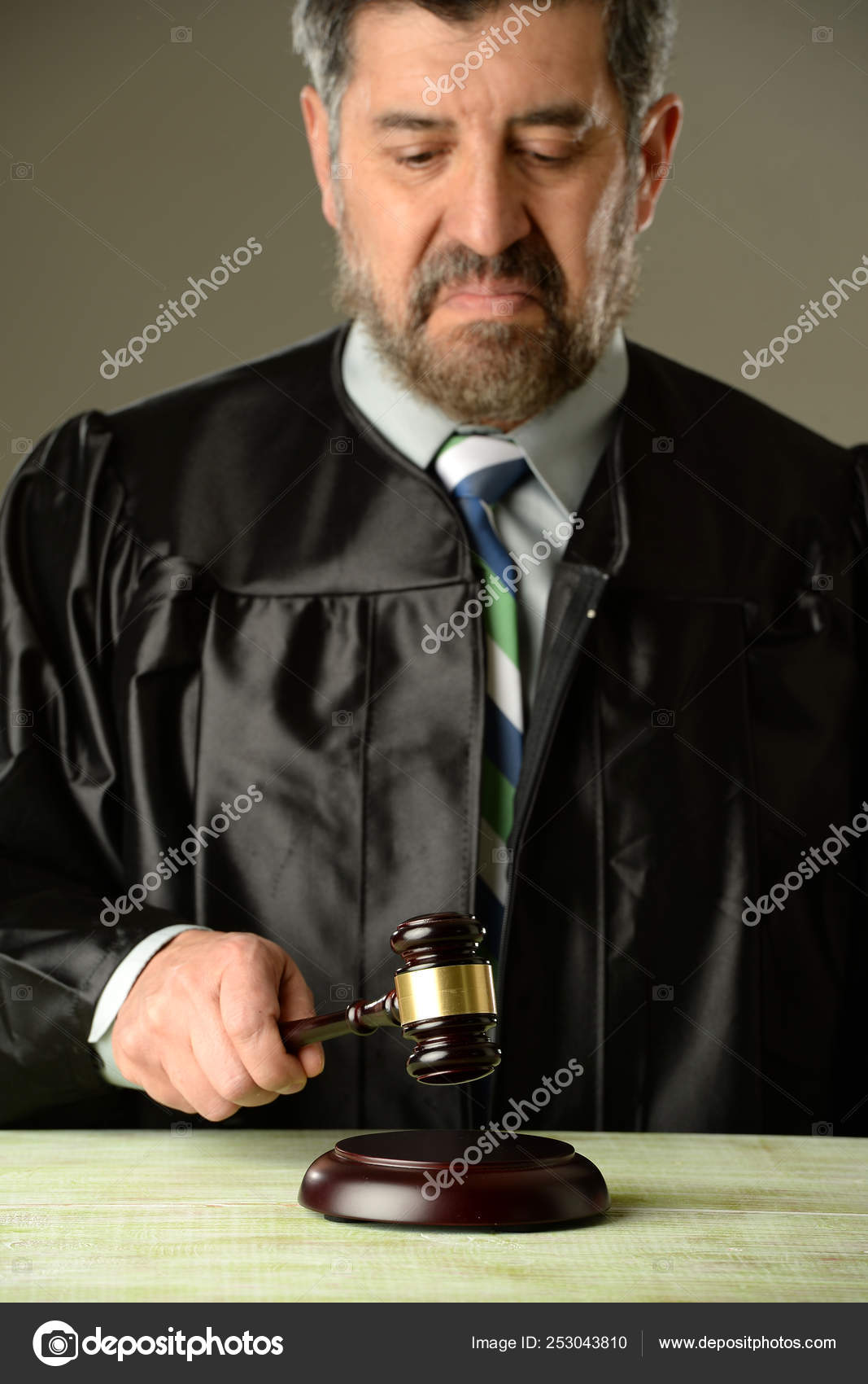 Judge holding a hammer Stock Photo by ©carlosphotos 253043810