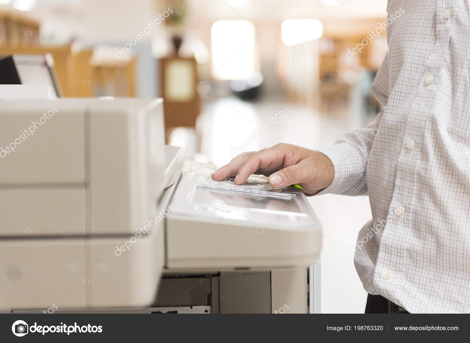 Man Using Copier Office — Stock Photo © nirat.pix #198763320