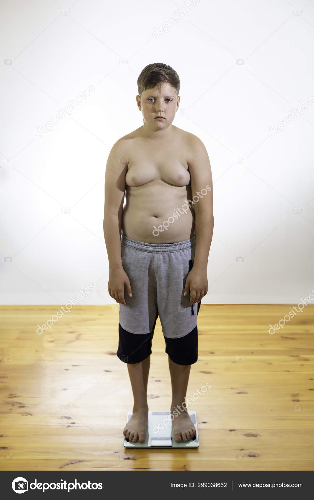Boy Standing Scales Looking Camera Child Obesity Concept — Stock Photo ...