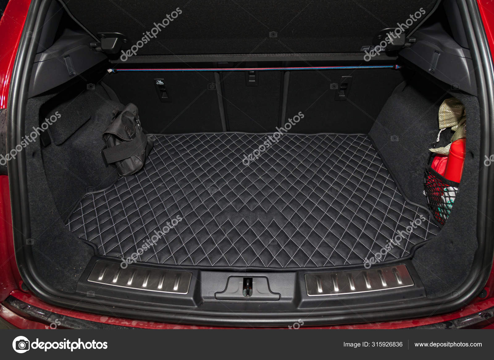 Red Car luggage space in the body of the SUV hatchback with open ...