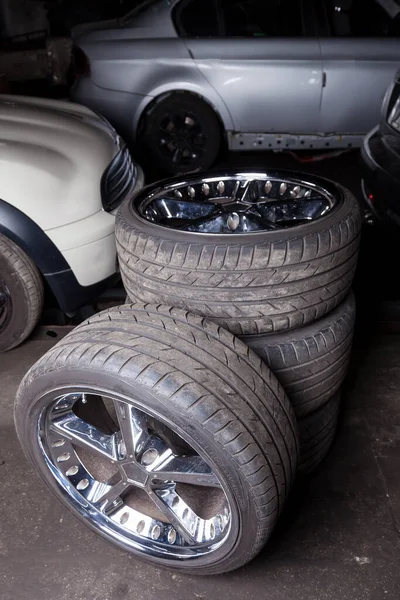 Stack of car wheels Stock Photos, Royalty Free Stack of car wheels ...