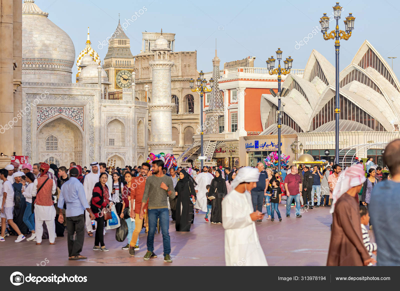The crowded streets in the Global Village with mockups of famous ...