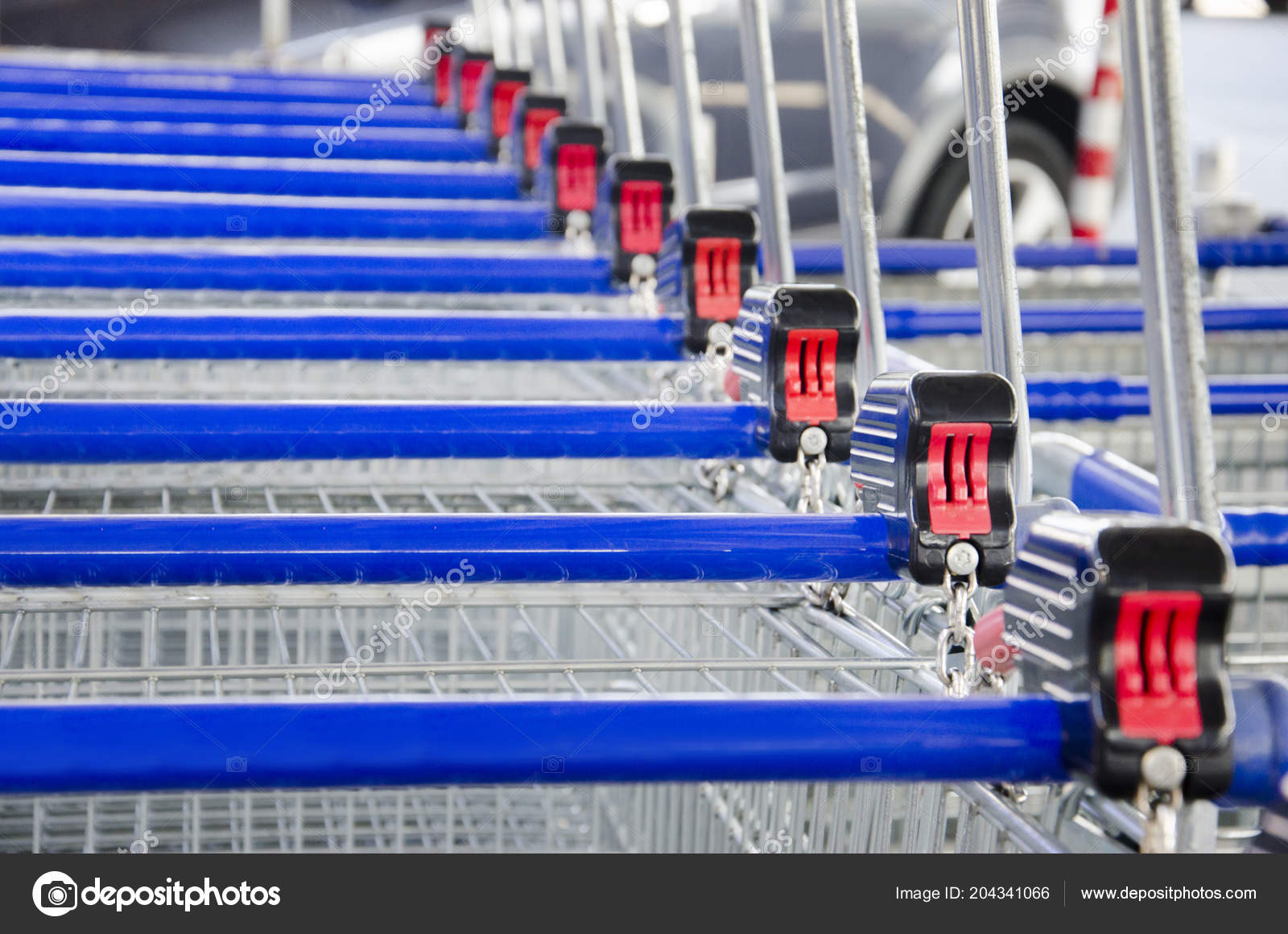 Row Supermarket Shopping Cart Trolleys — Stock Photo © zefart #204341066