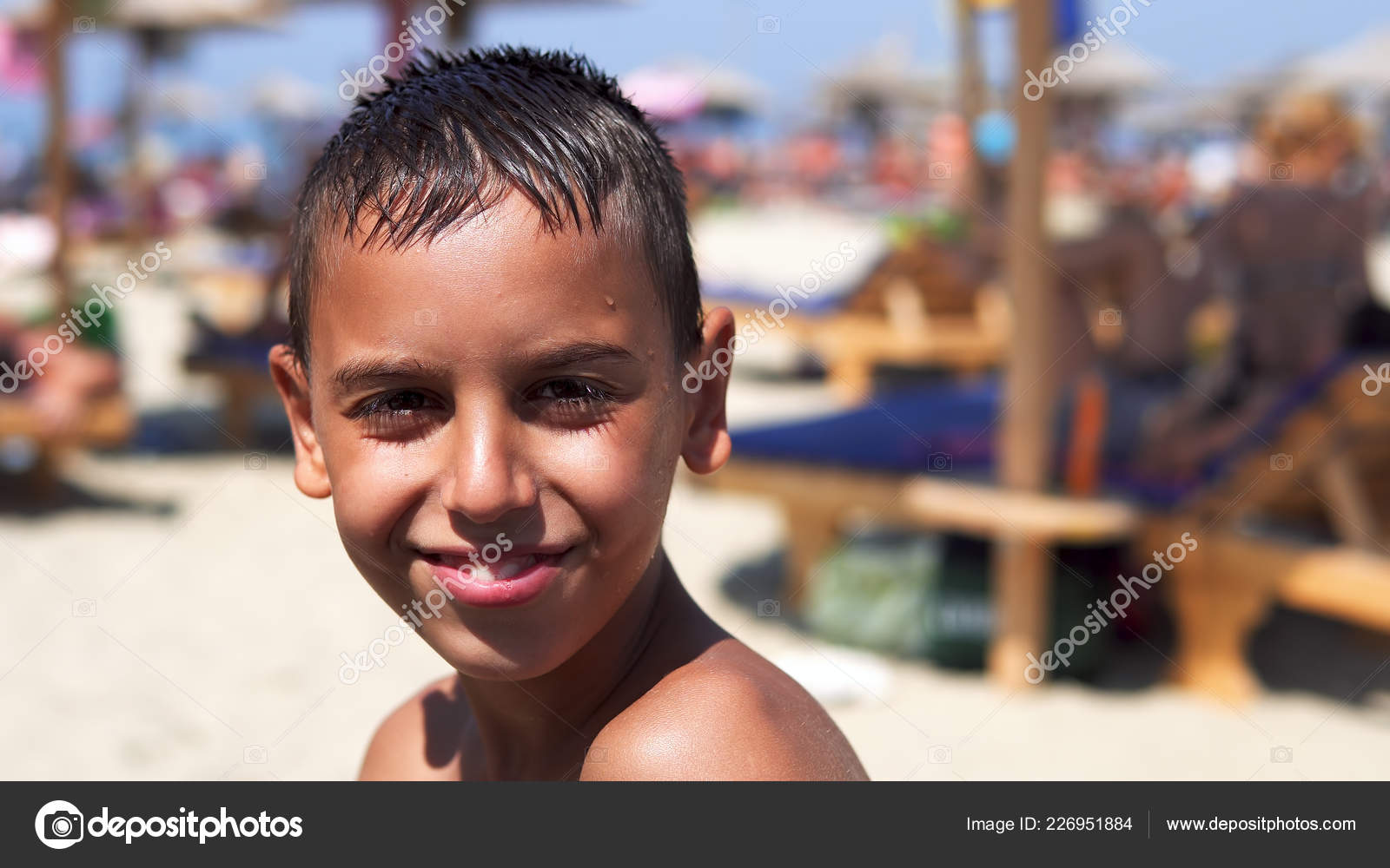 Happy Hispanic Boy Beach Smiling Camera Cinematic Dof Stock Photo by ...