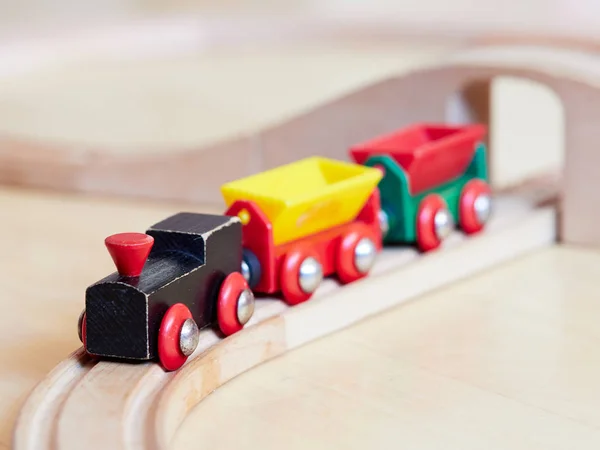 Wooden toy train running on miniature track ⬇ Stock Photo, Image by ...