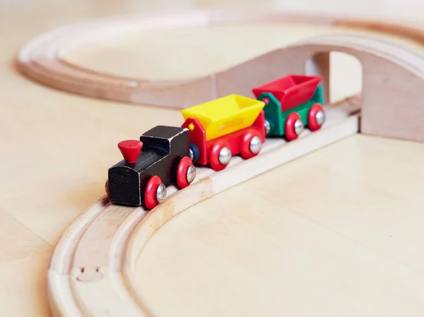 Wooden toy train running on miniature track ⬇ Stock Photo, Image by ...