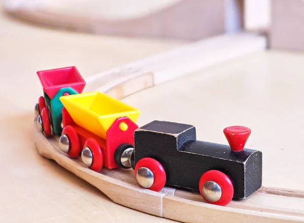 Wooden toy train running on miniature track ⬇ Stock Photo, Image by ...