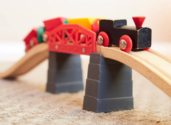 Wooden toy train running on miniature track ⬇ Stock Photo, Image by ...