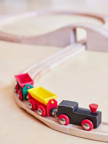 Wooden toy train running on miniature track ⬇ Stock Photo, Image by ...