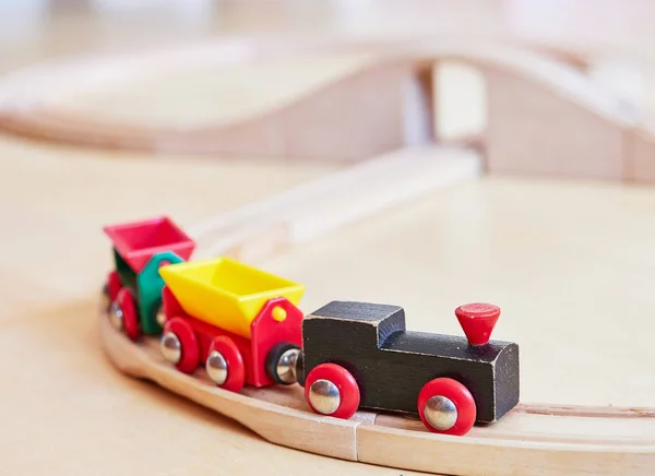 Wooden toy train running on miniature track ⬇ Stock Photo, Image by ...