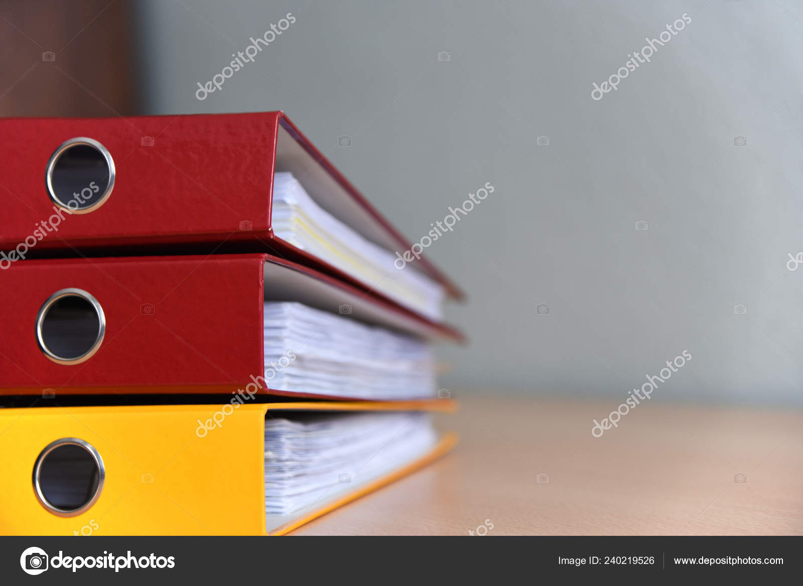Large color folders for documents on the table in the office, close-up ...
