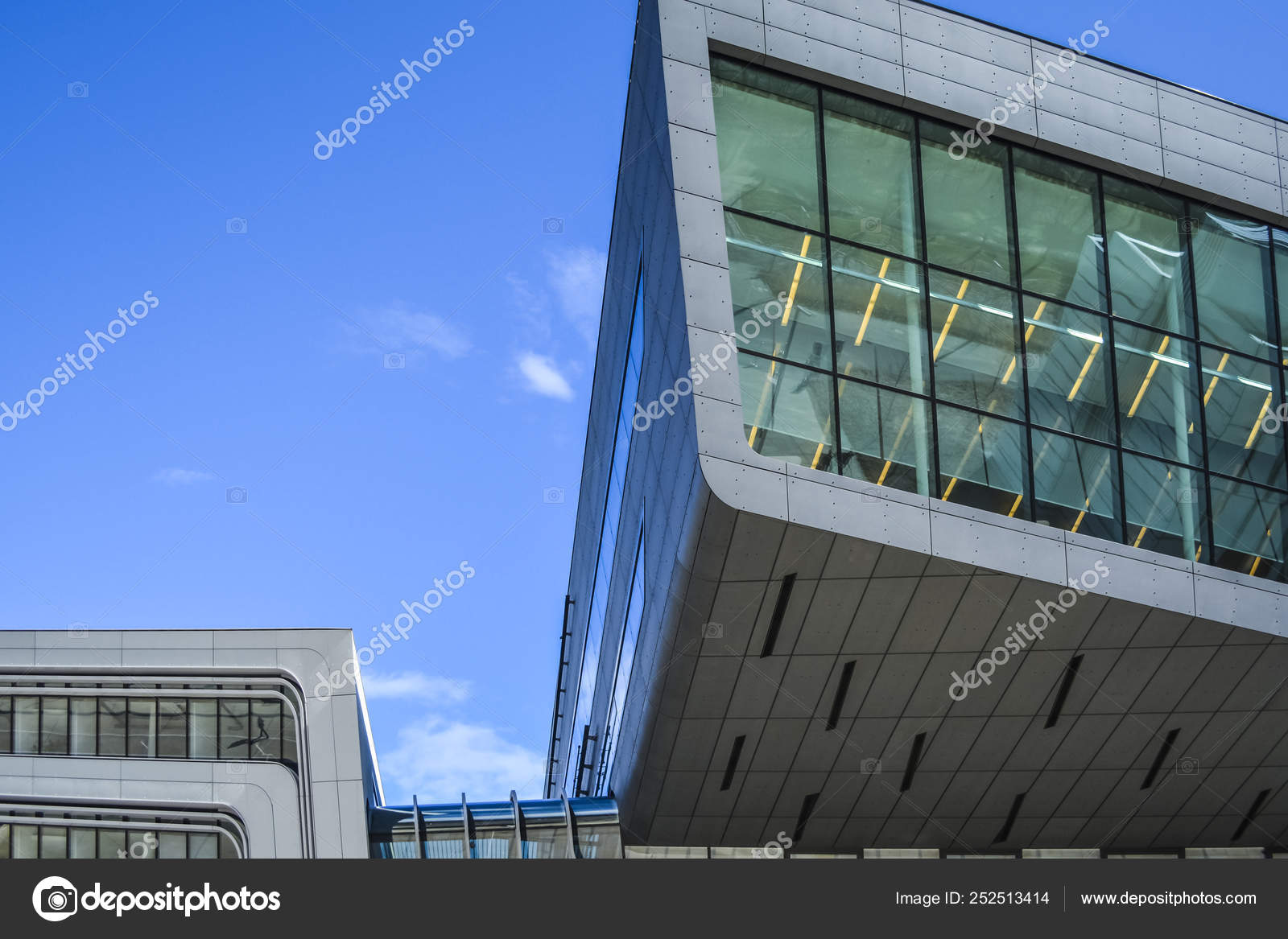 Modern buildings of unusual forms from glass and metal. Geometry of ...