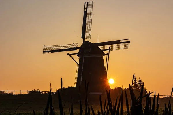 Windmill country sunset Stock Photos, Royalty Free Windmill country ...