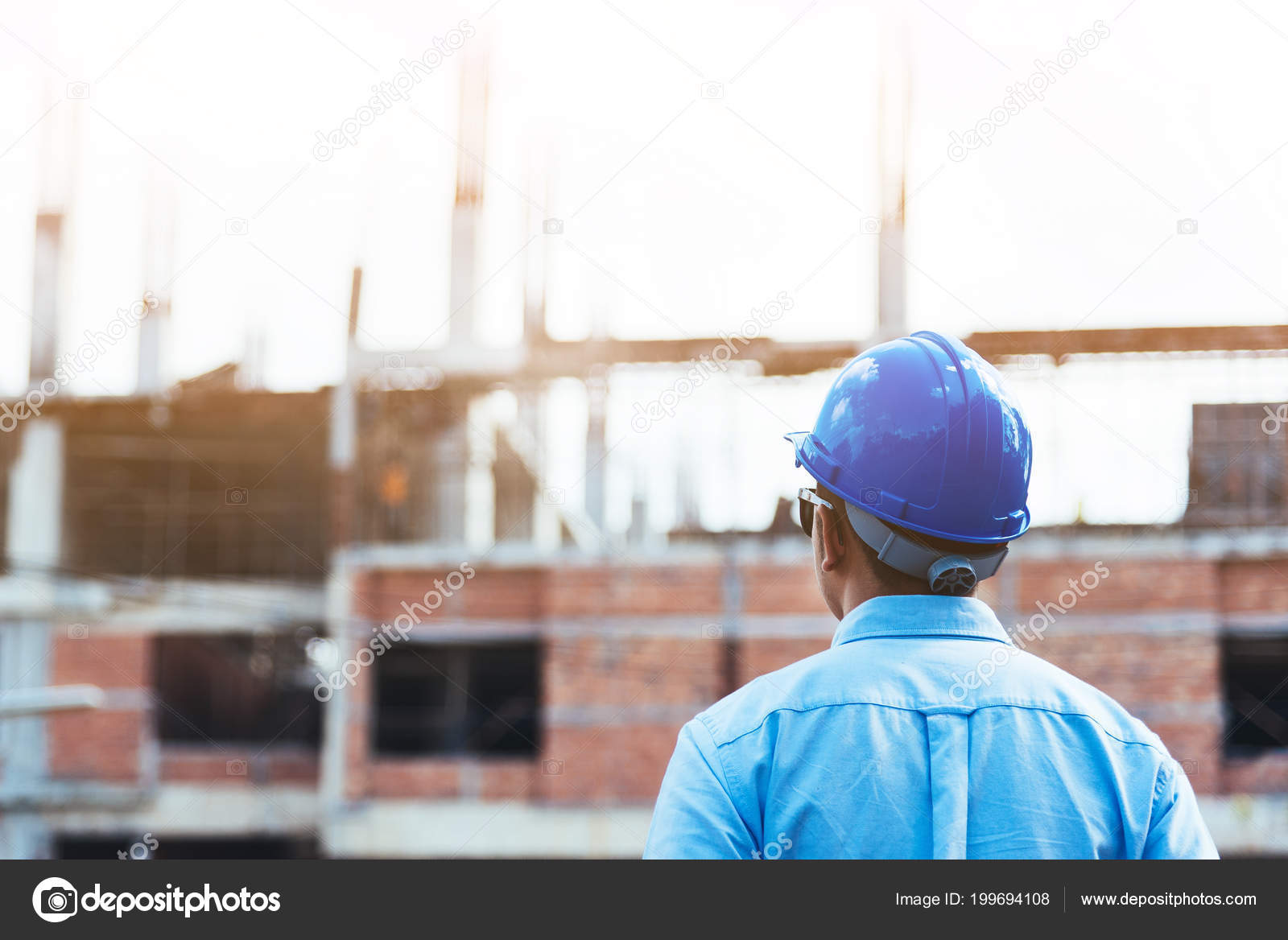 Asian Man Civil Engineer Wearing Blue Safety Helmet Checking Working ...