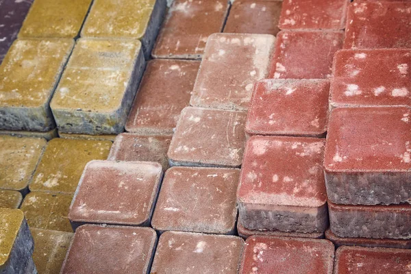 pile of colored concrete paving slab close up - Stock Image - Everypixel