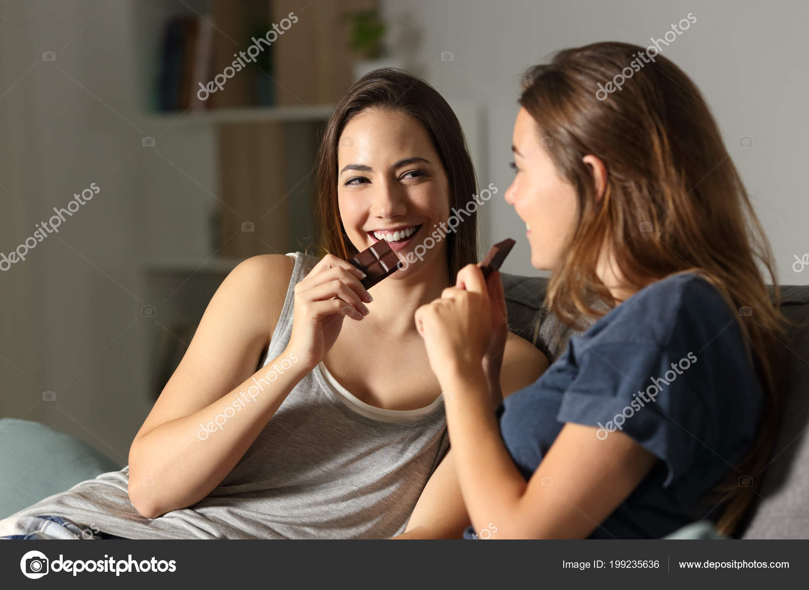 Two Friends Enjoying Eating Chocolate Night Sitting Couch Living Room ...