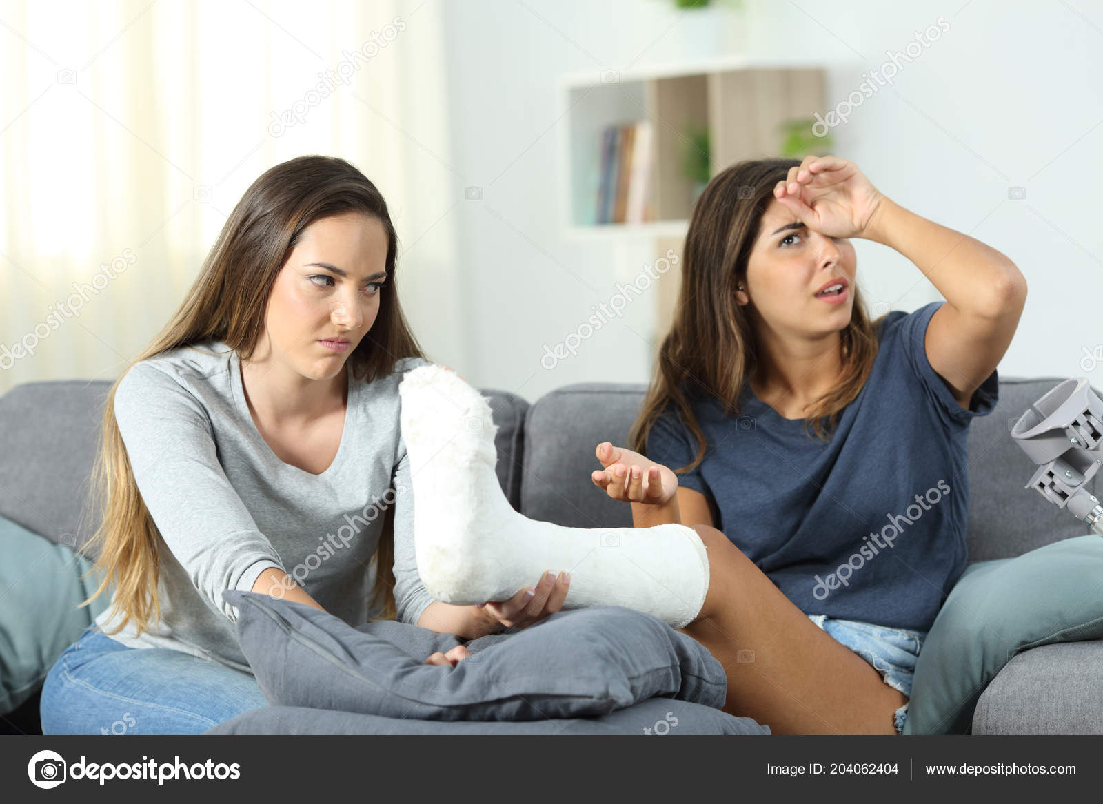 Angry Woman Helping Her Dramatic Disabled Roommate Sitting Couch Living ...
