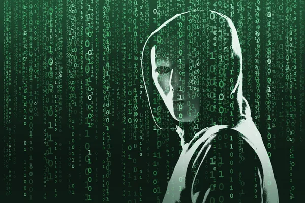Anonymous computer hacker over abstract digital background. Obscured dark face in mask and hood ...