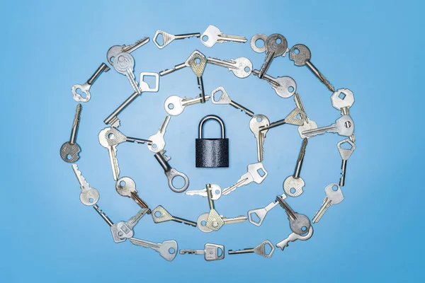 Keys set in spider web shape. Security and protection concept. Choosing ...