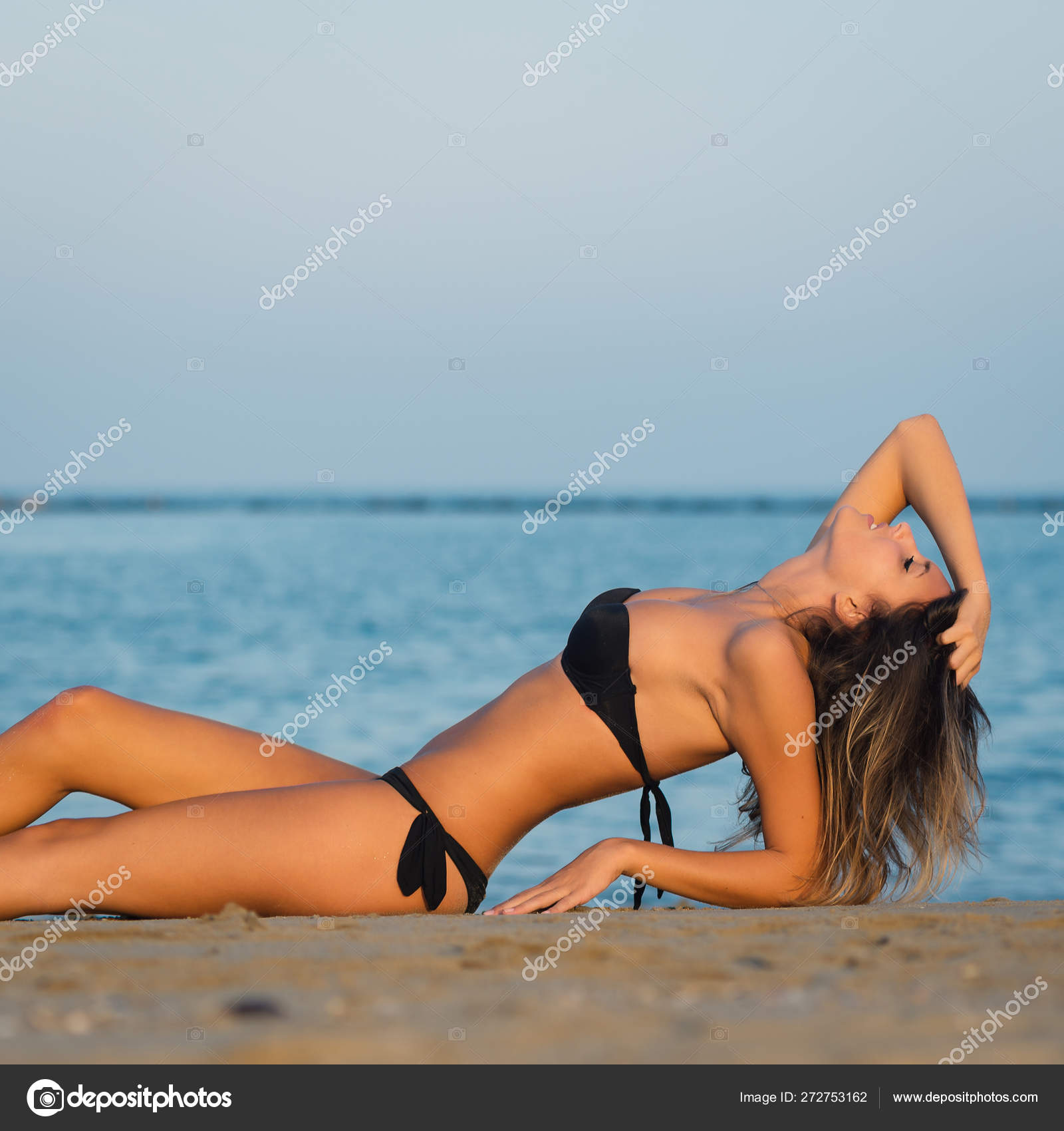 Sexy Woman Wearing Bikini Posing Beach — Stock Photo © pio3 #272753162