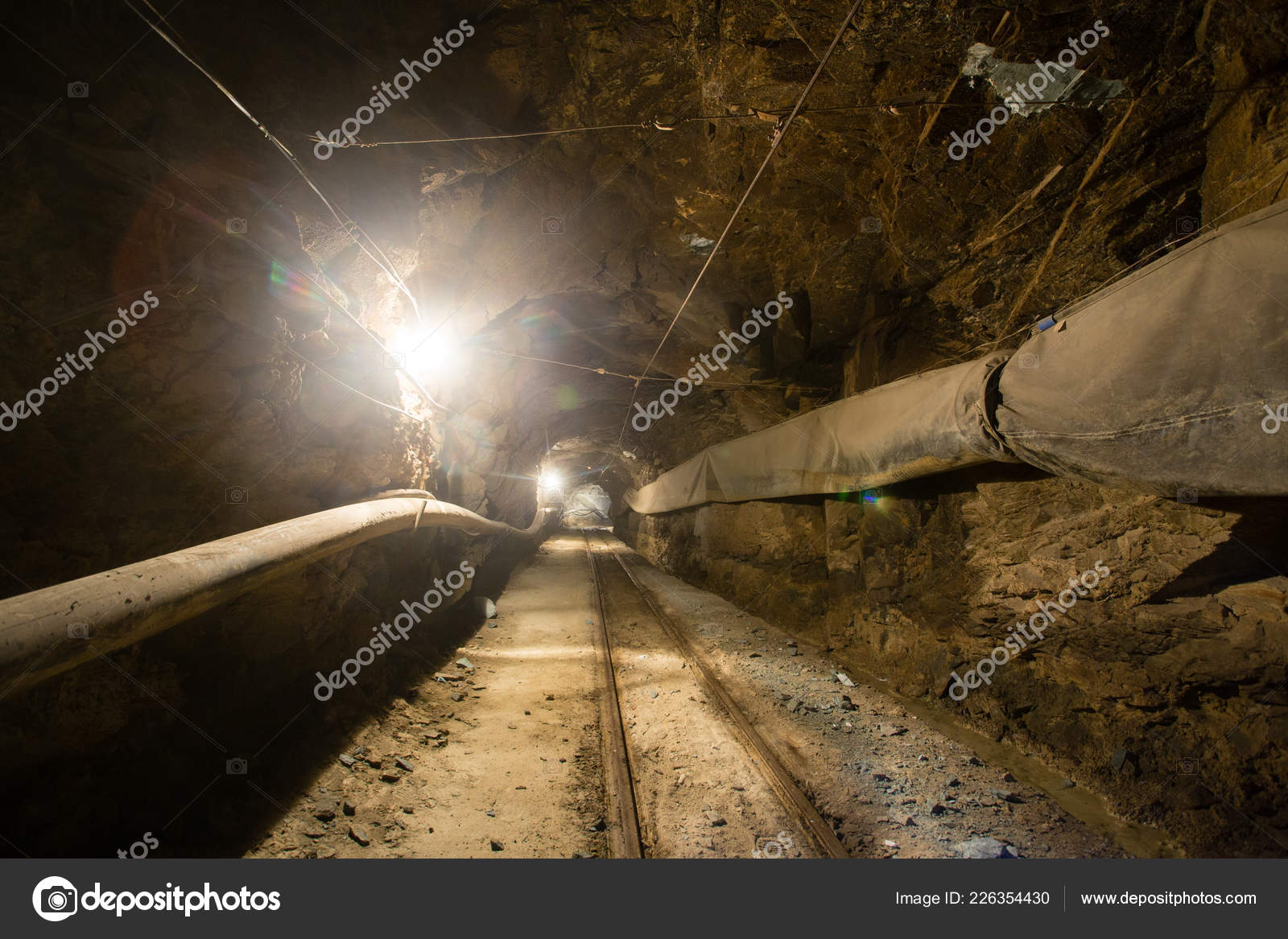 Underground Gold Mine Shaft Tunnel Drift Rails Light Stock Photo by ...