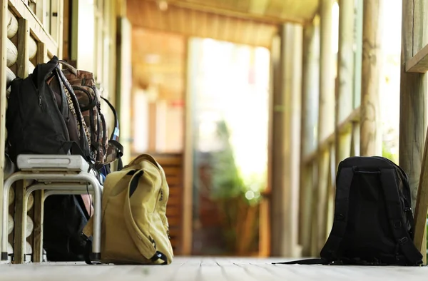 isolated student school bags back packs duffle bags outside a high ...