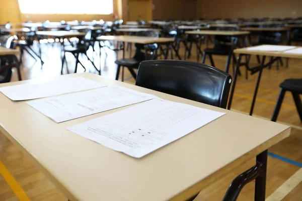 exam examination room or hall set up ready for students to sit test ...
