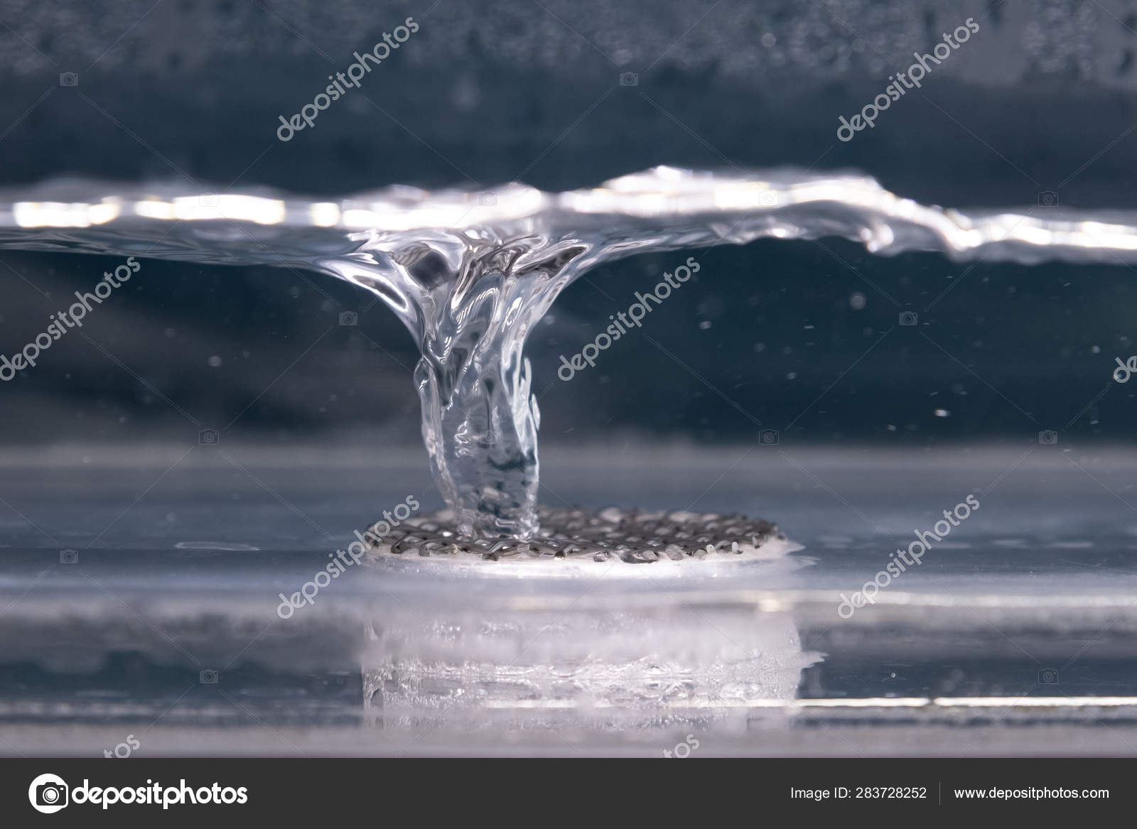 Formation of a funnel when draining water close-up — Stock Photo ...
