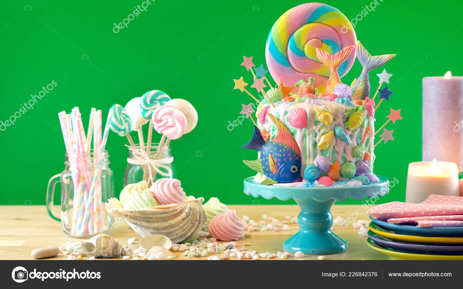 Mermaid theme candyland cake with glitter tails, shells and sea ...