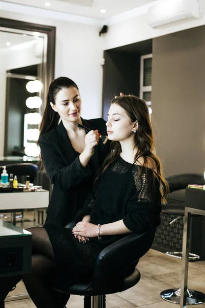 client and makeup artist in the beauty salon - Stock Image - Everypixel