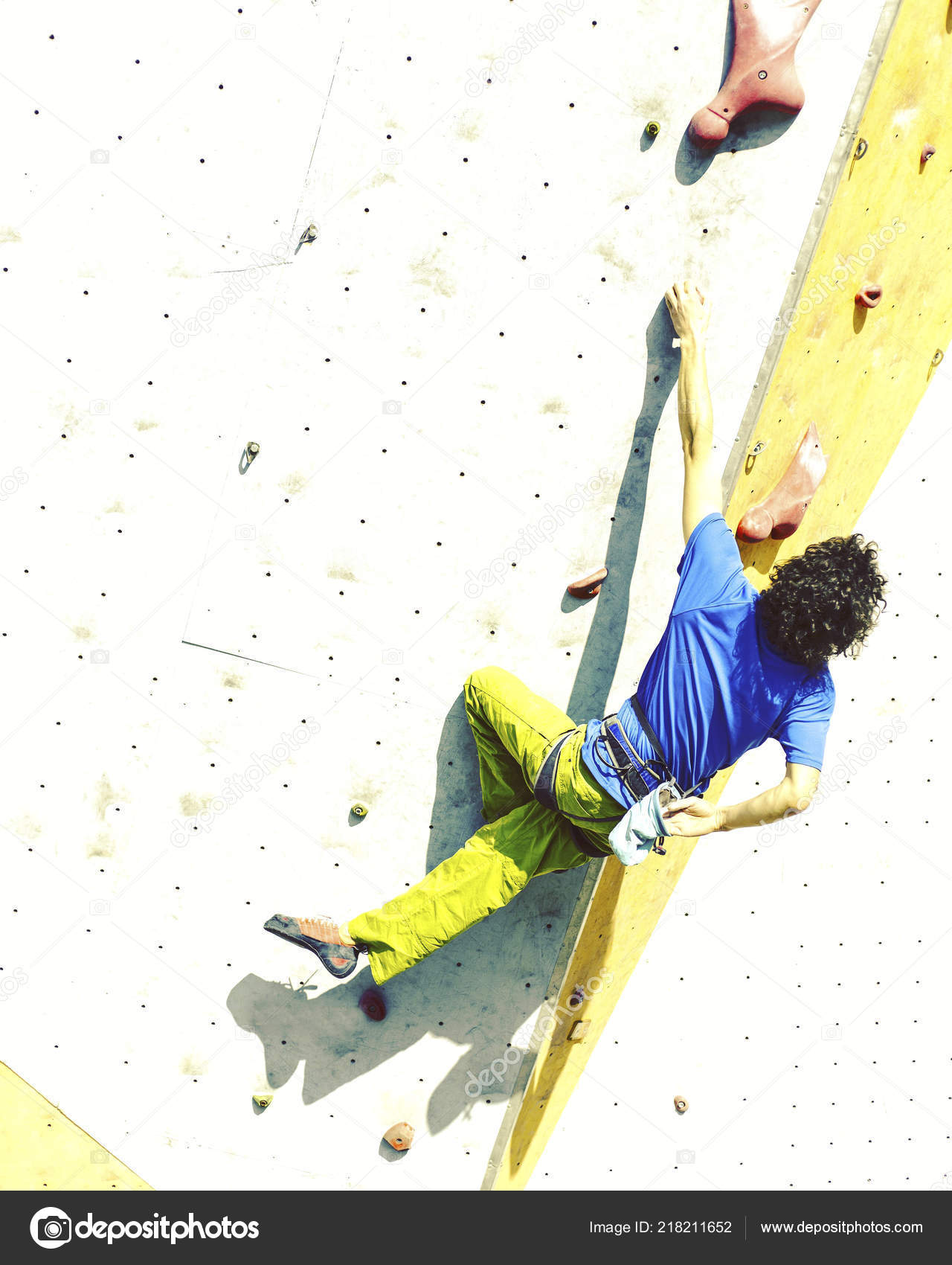 Man Bouldering Indoor Climbing Centre Climber Practicing Rock Climbing ...