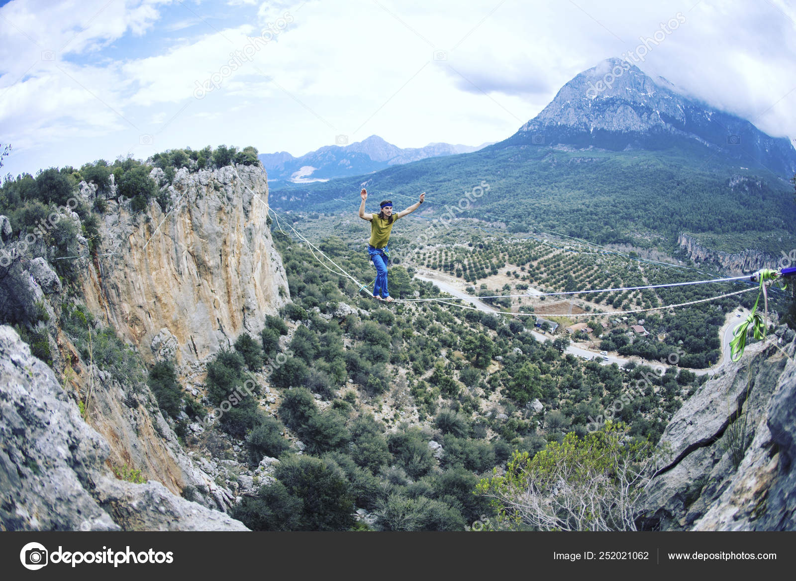 Man balancing on the rope concept of risk taking and challenge. Stock ...