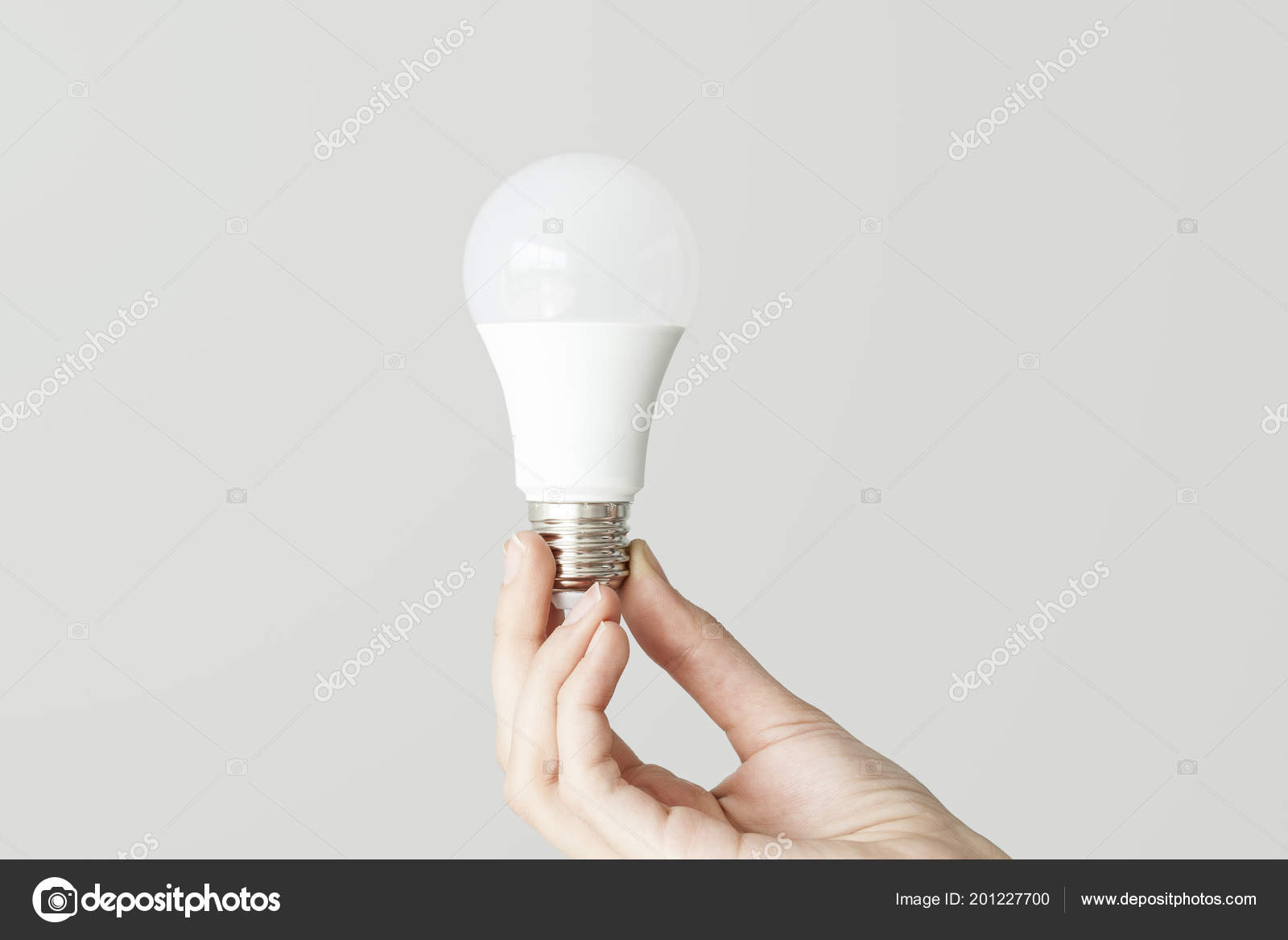 Hand Holding Light Bulb ⬇ Stock Photo, Image by © seb_ra #201227700