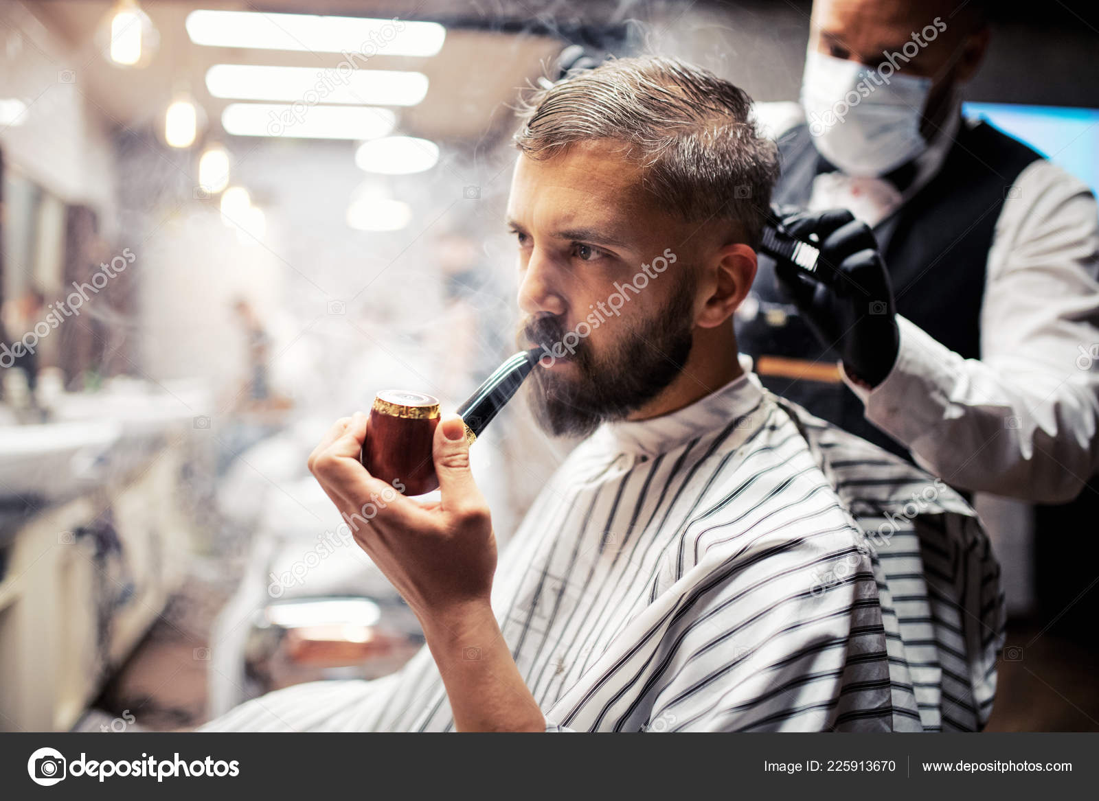 Hipster man client visiting haidresser and hairstylist in barber shop ...
